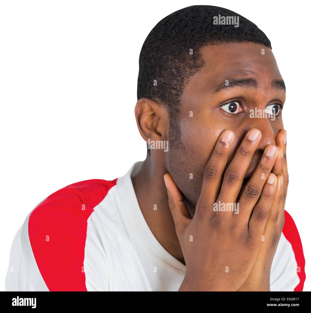 Nervous football fan looking ahead Stock Photo - Alamy