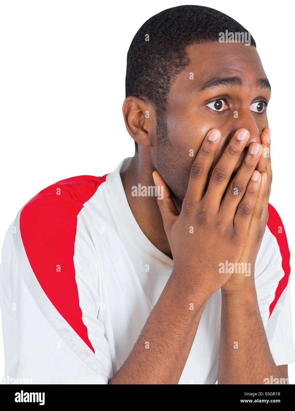 Nervous football fan looking ahead Stock Photo - Alamy