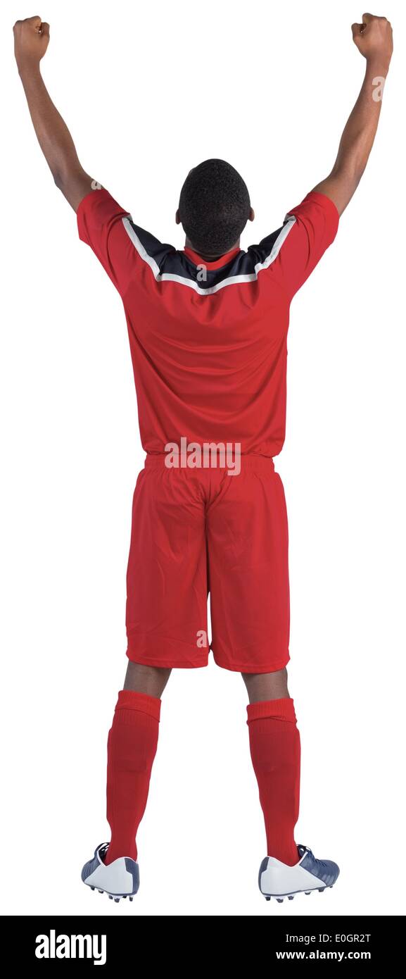 Football player in red cheering Stock Photo - Alamy