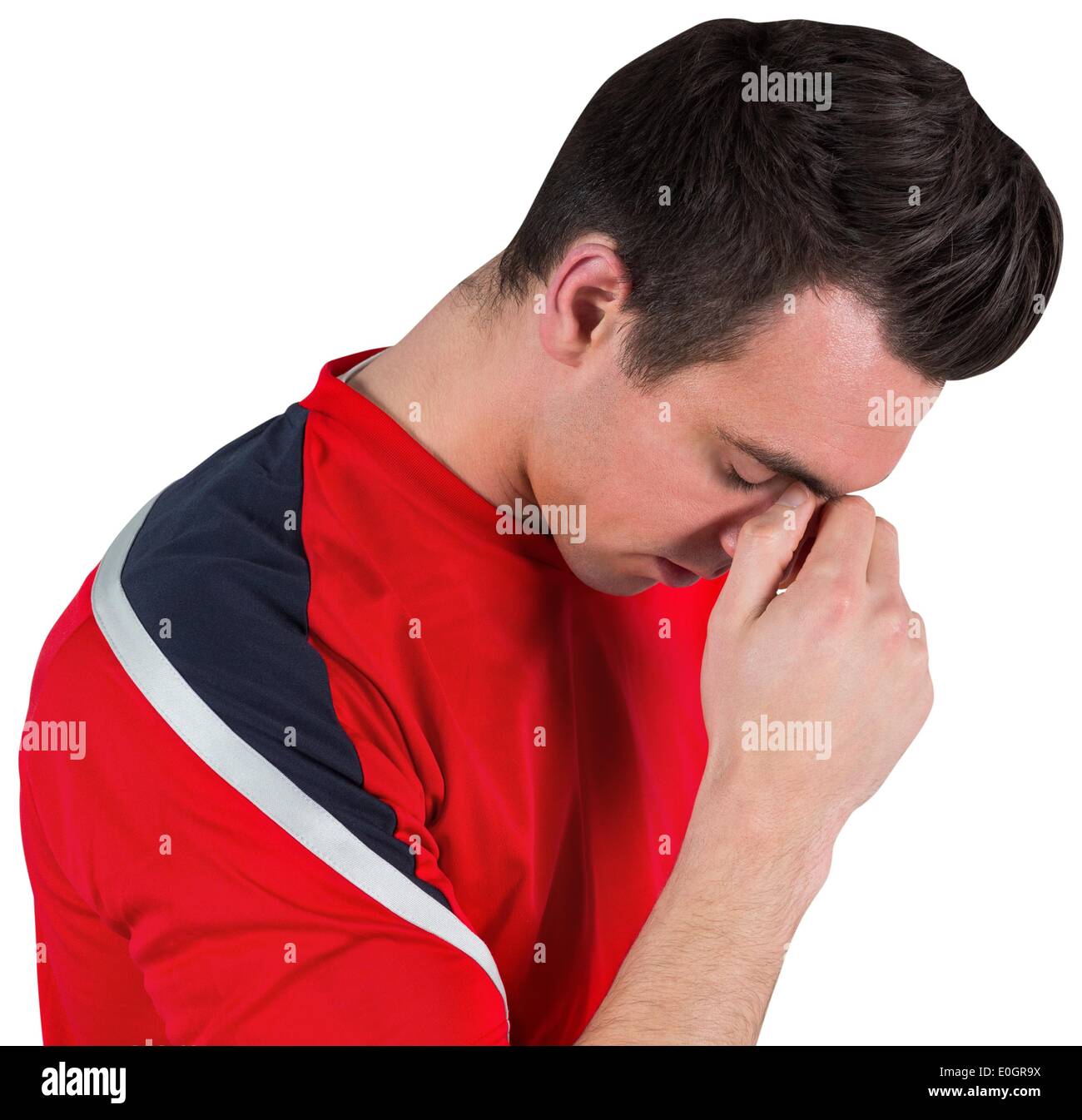 Disappointed football fan looking down Stock Photo - Alamy