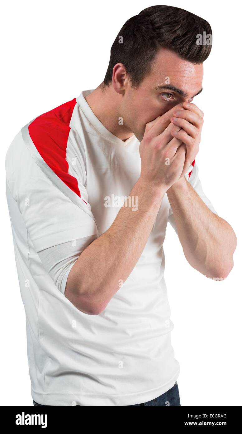 Disappointed football fan looking down Stock Photo - Alamy