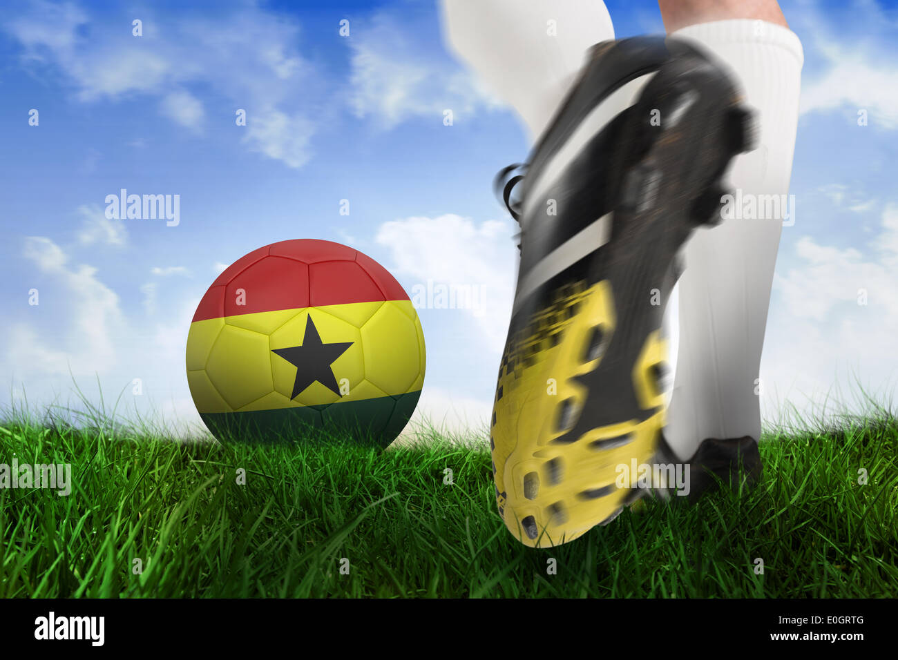 Football boot kicking ghana ball Stock Photo - Alamy