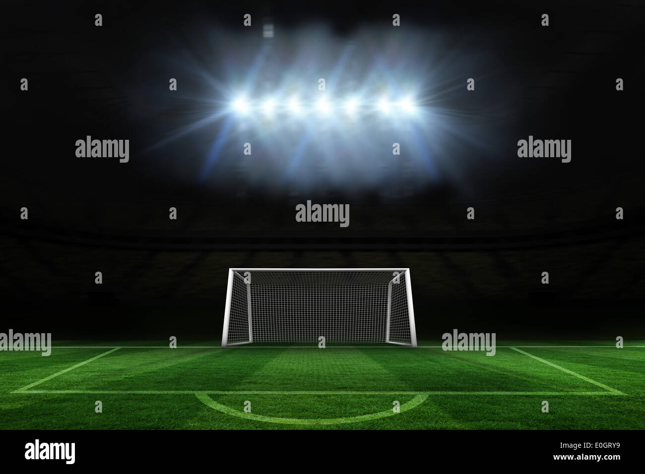 Football pitch and goal under spotlights Stock Photo - Alamy