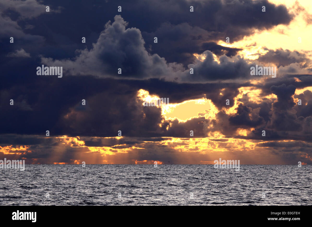 Sky with dramatic clouds at sunrise hi-res stock photography and images ...