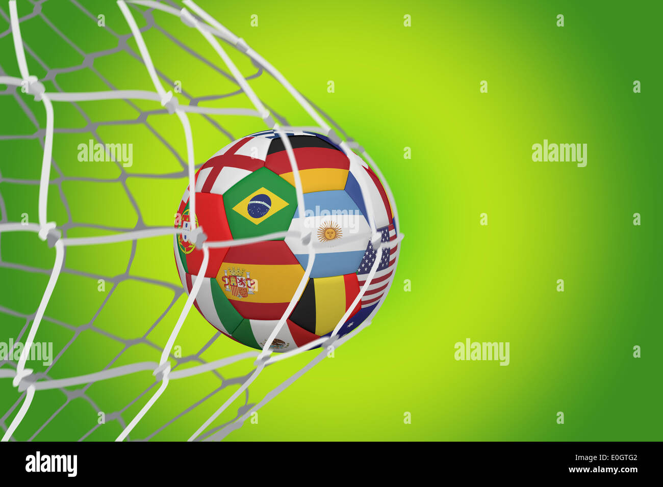 Football in multi national colours at back of net Stock Photo - Alamy