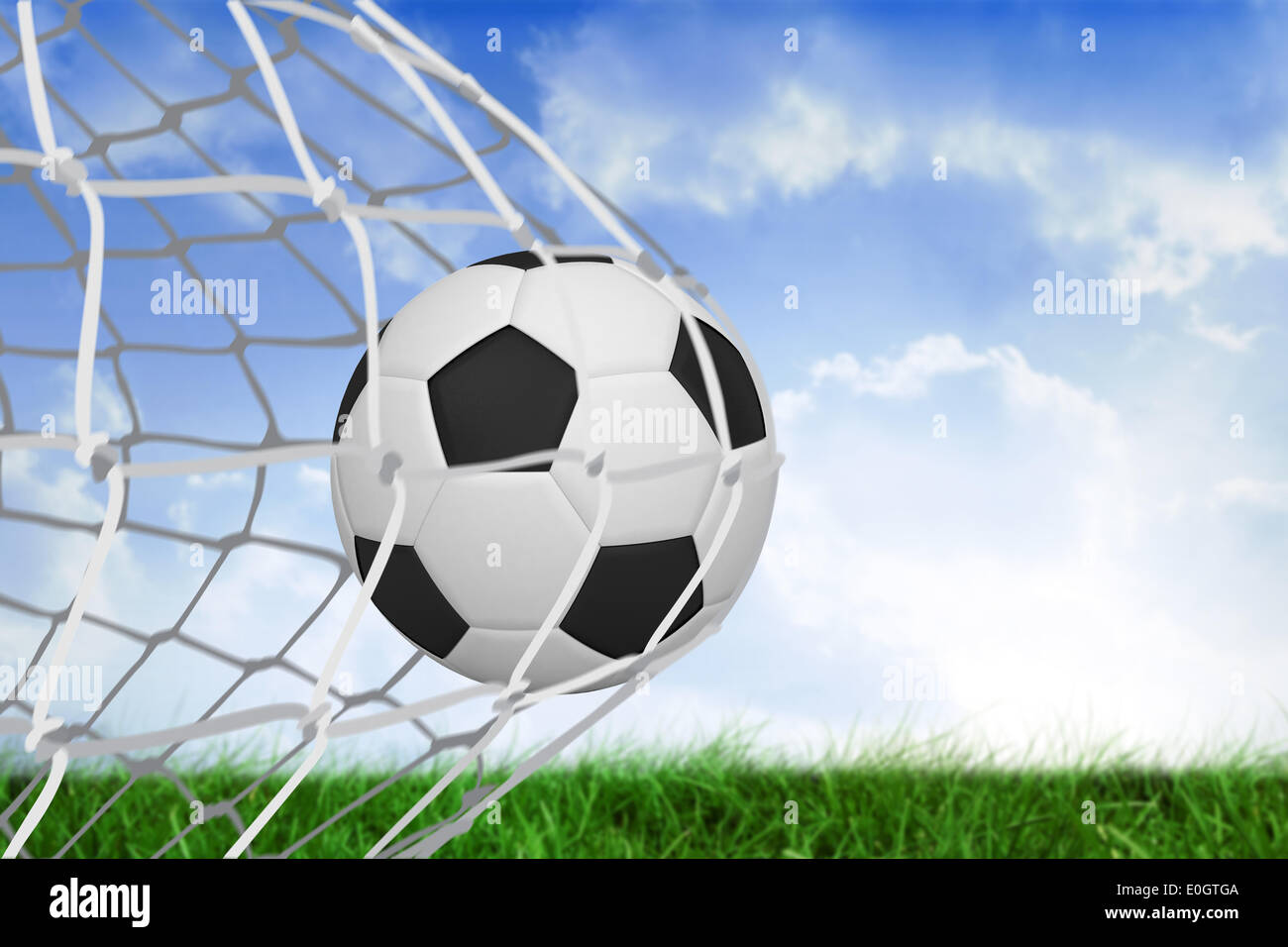Football at back of net Stock Photo - Alamy