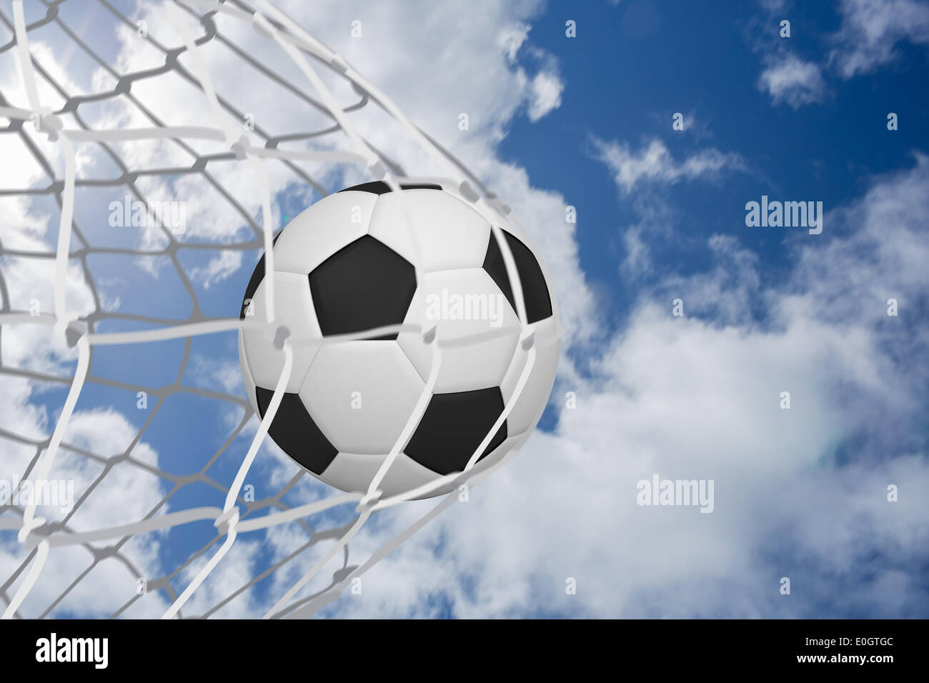 Football at back of net Stock Photo - Alamy
