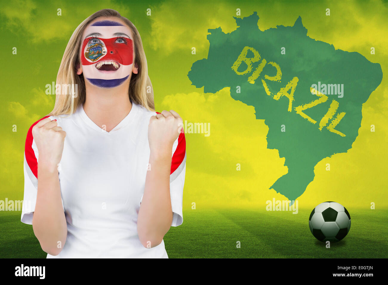 Excited costa rica fan in face paint cheering Stock Photo - Alamy