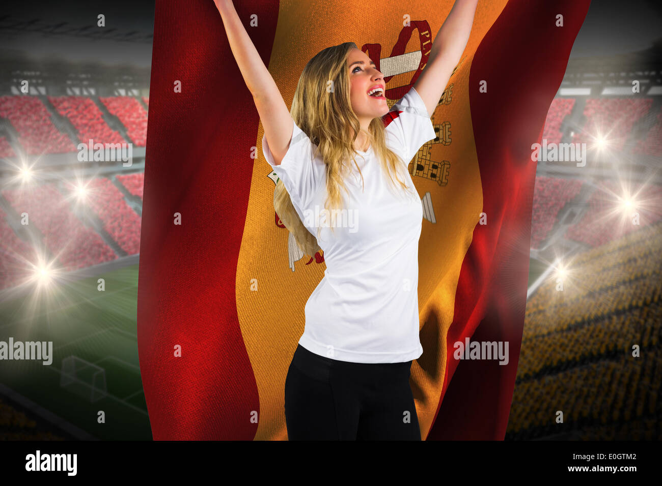 Pretty football fan in white cheering holding spain flag Stock Photo ...