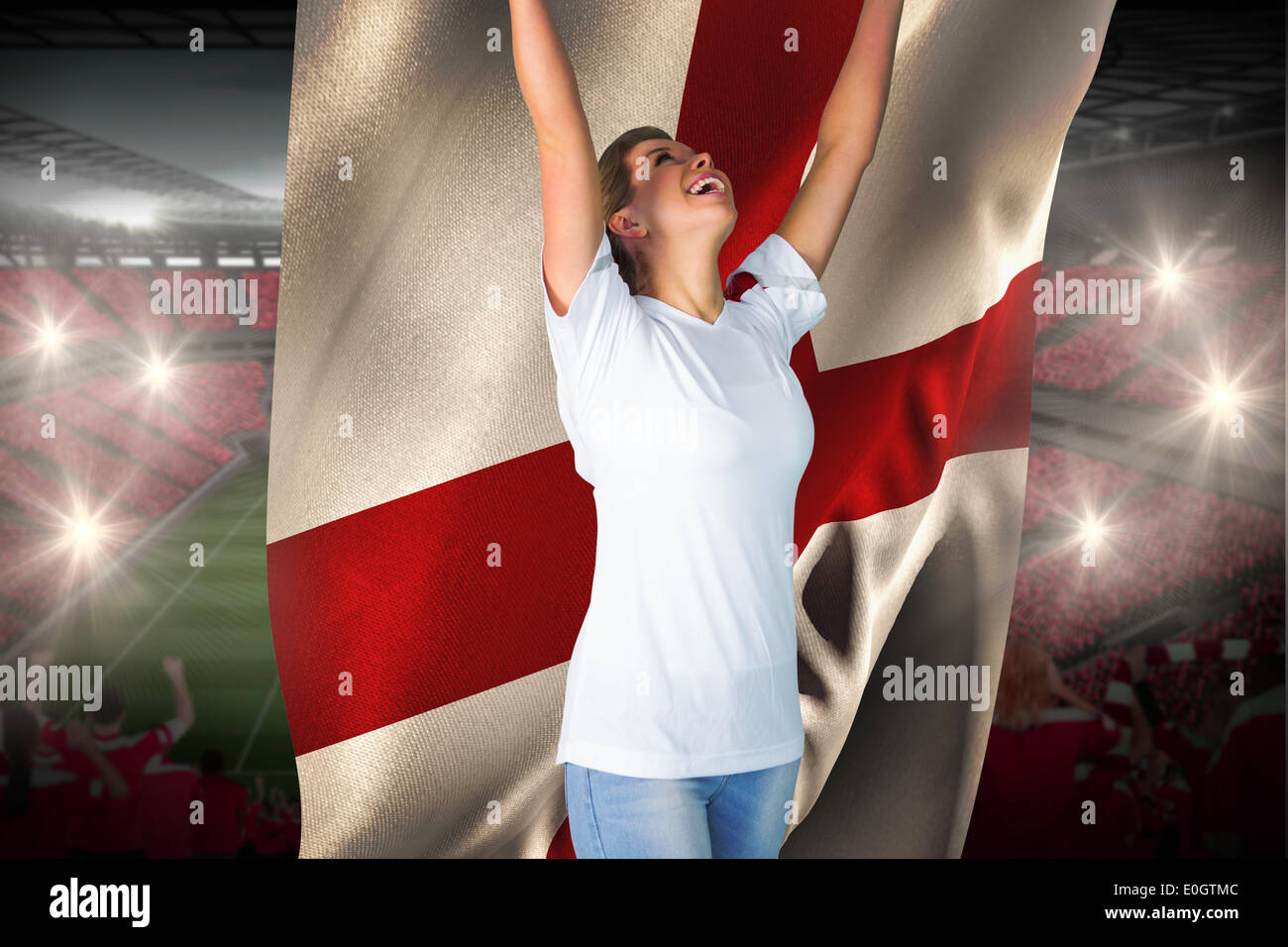 Pretty football fan in white cheering holding england flag Stock Photo ...