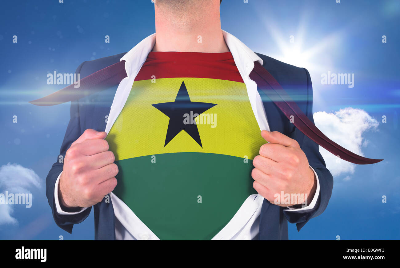 Businessman opening shirt to reveal ghana flag Stock Photo - Alamy