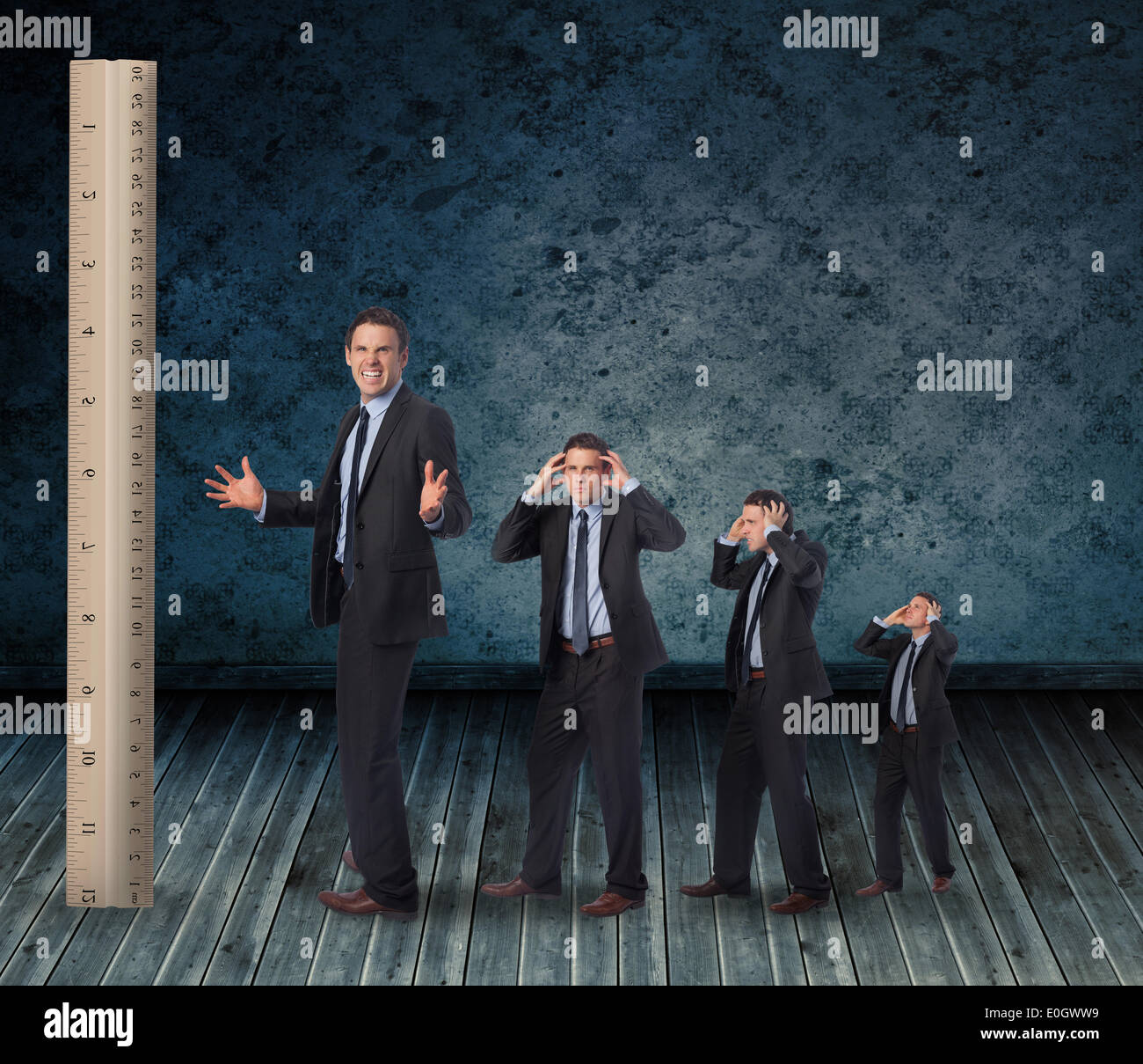 Composite image of multiple image of angry businessman with ruler Stock ...
