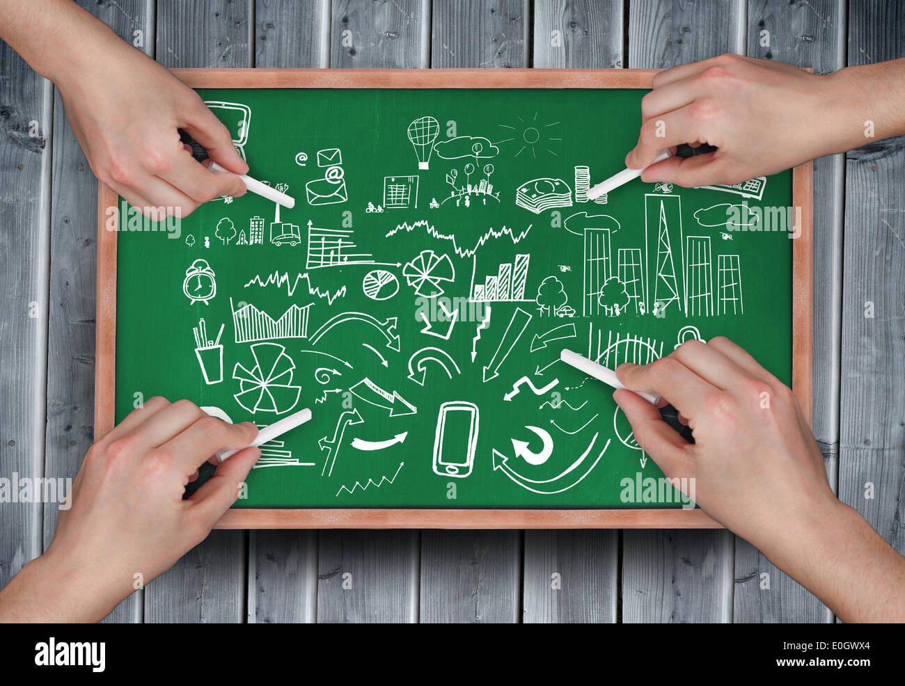 Composite image of multiple hands drawing brainstorm with chalk Stock ...