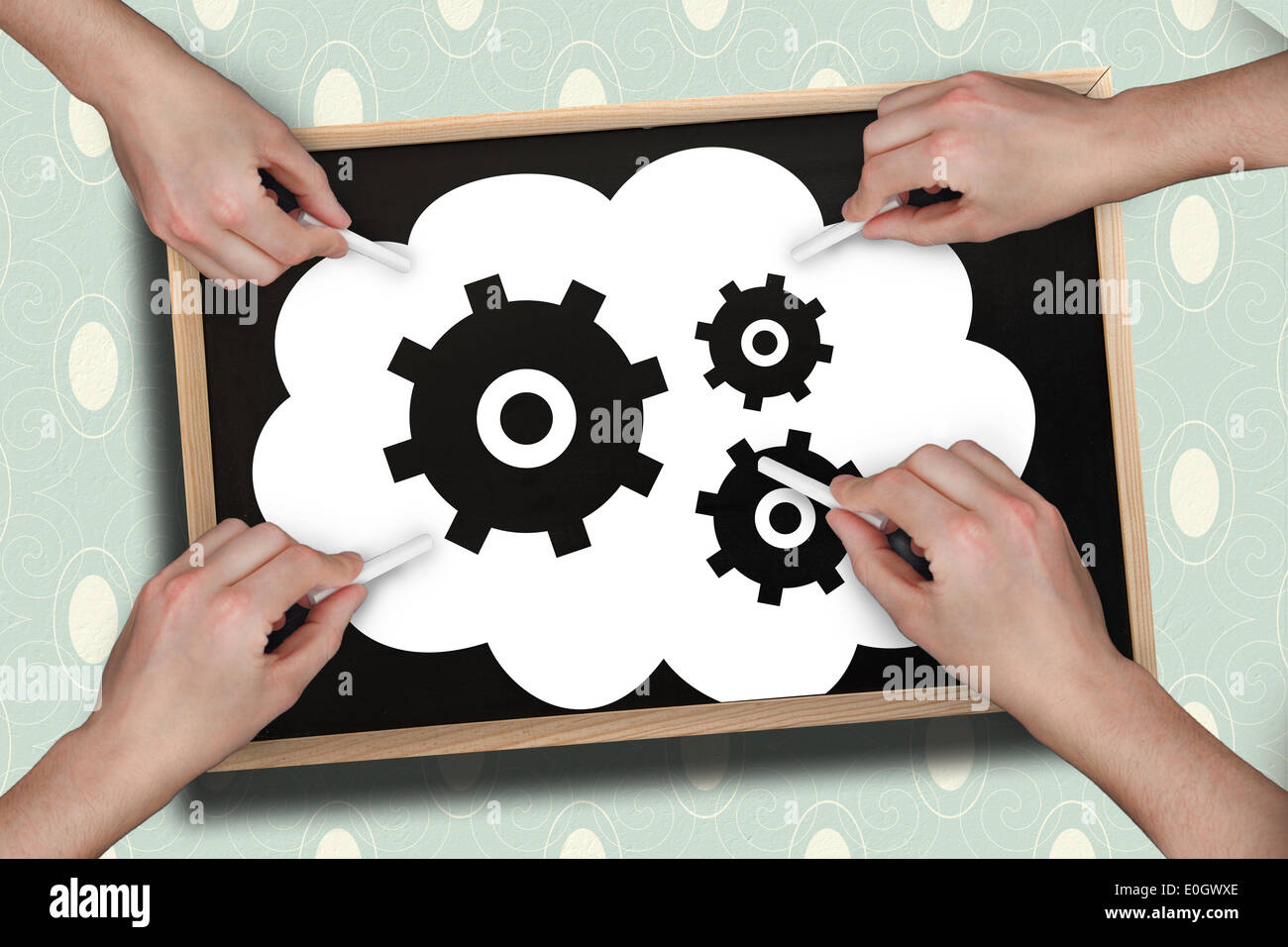 Composite image of multiple hands drawing cogs with chalk Stock Photo ...