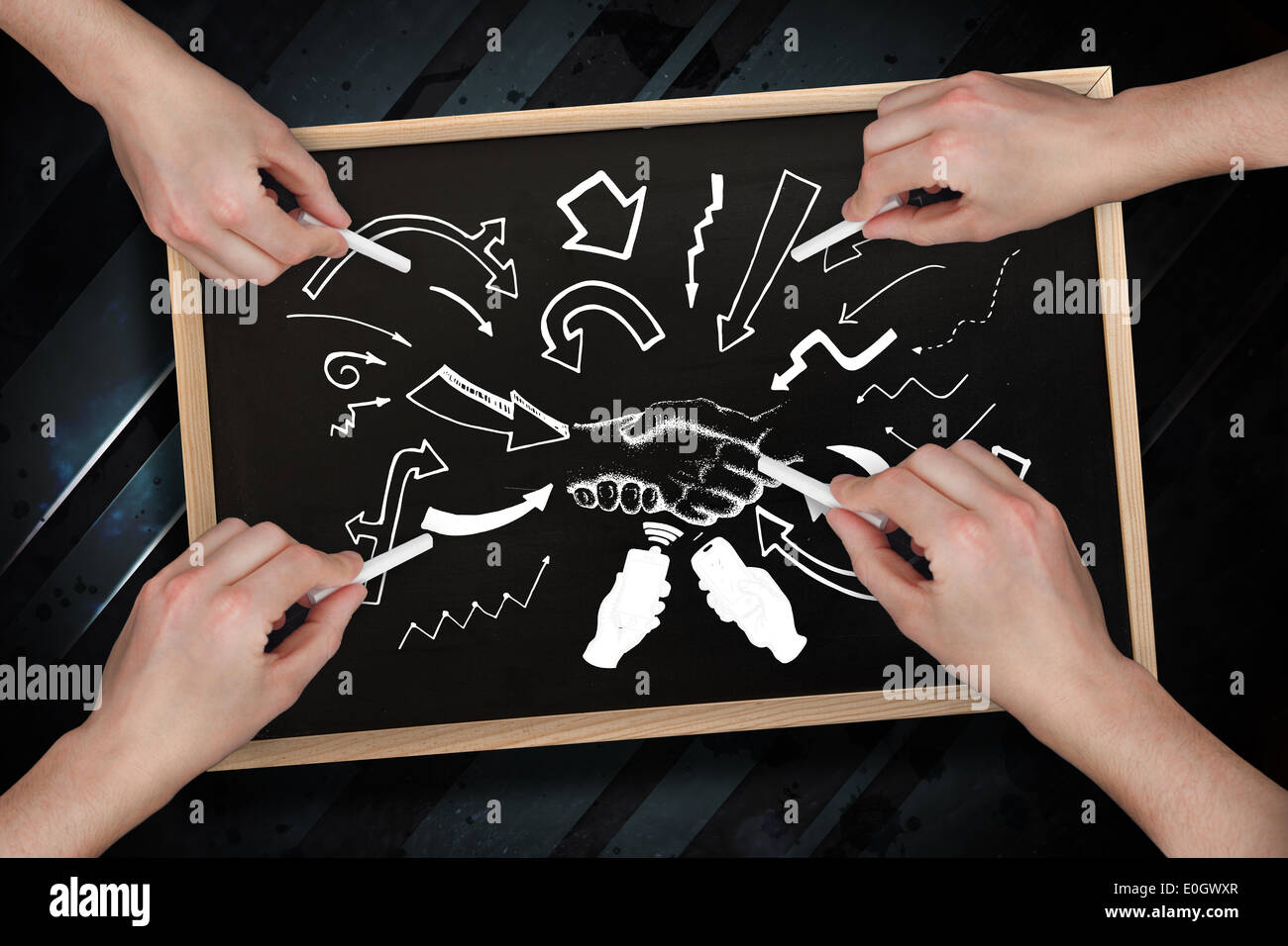 Composite image of multiple hands drawing arrows with chalk Stock Photo ...