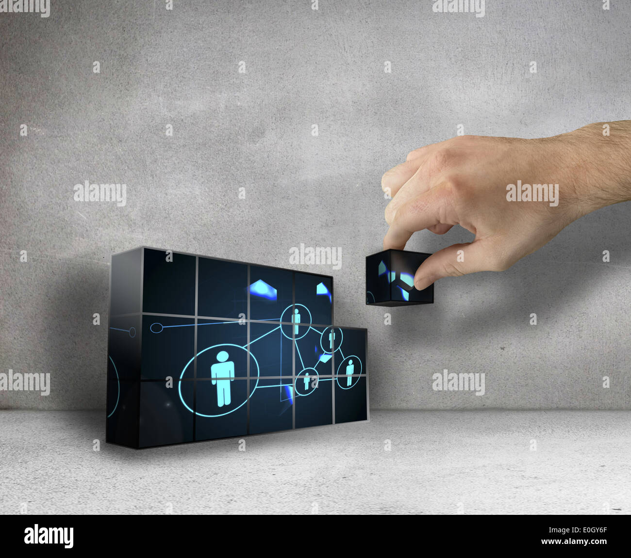 Composite image of hand building wall Stock Photo - Alamy