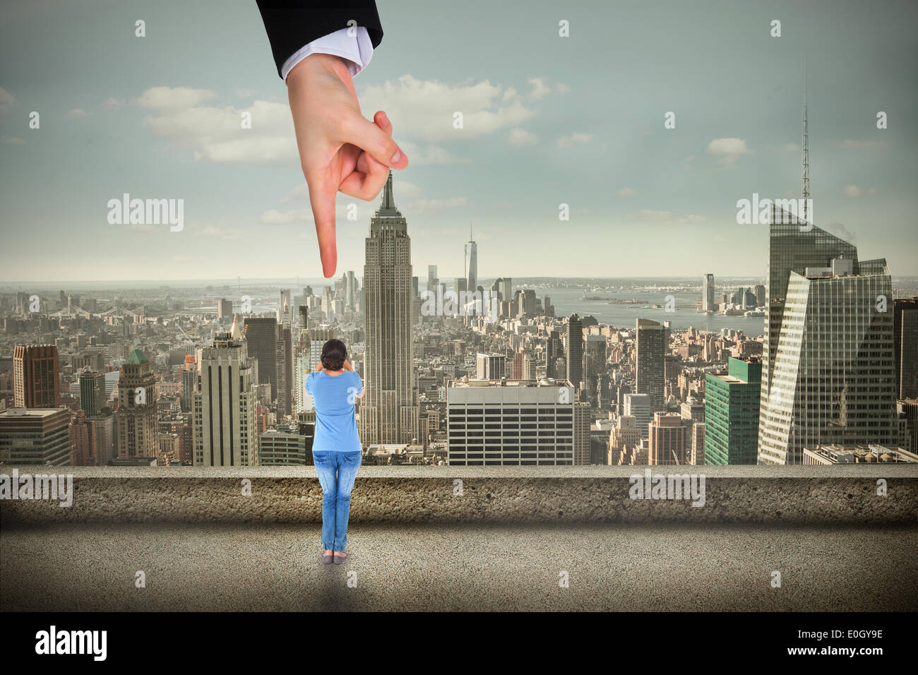 Giant hand pointing at pretty brunette shouting Stock Photo - Alamy