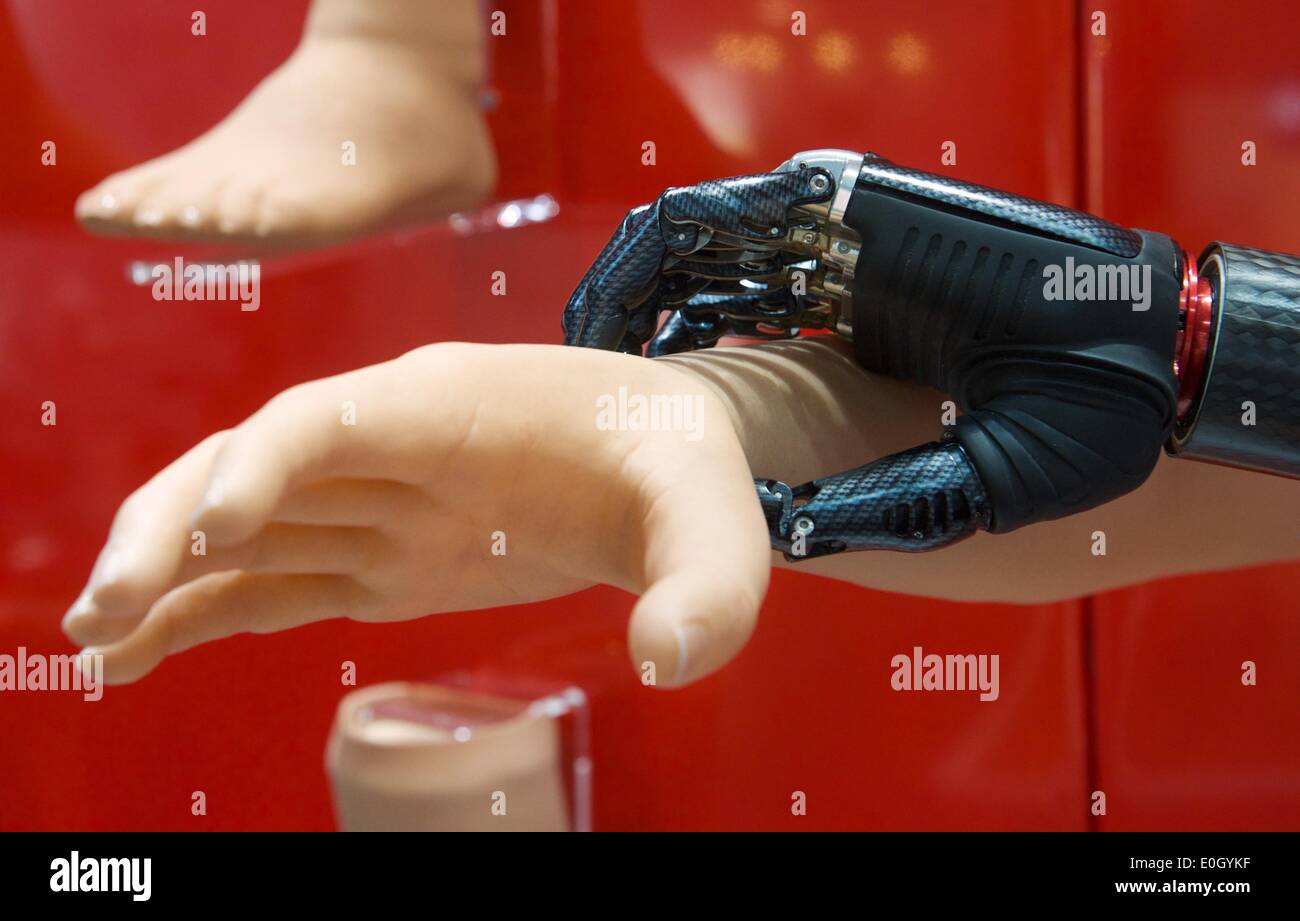 Leipzig, Germany. 13th May, 2014. A bionic hand reached for a arm ...