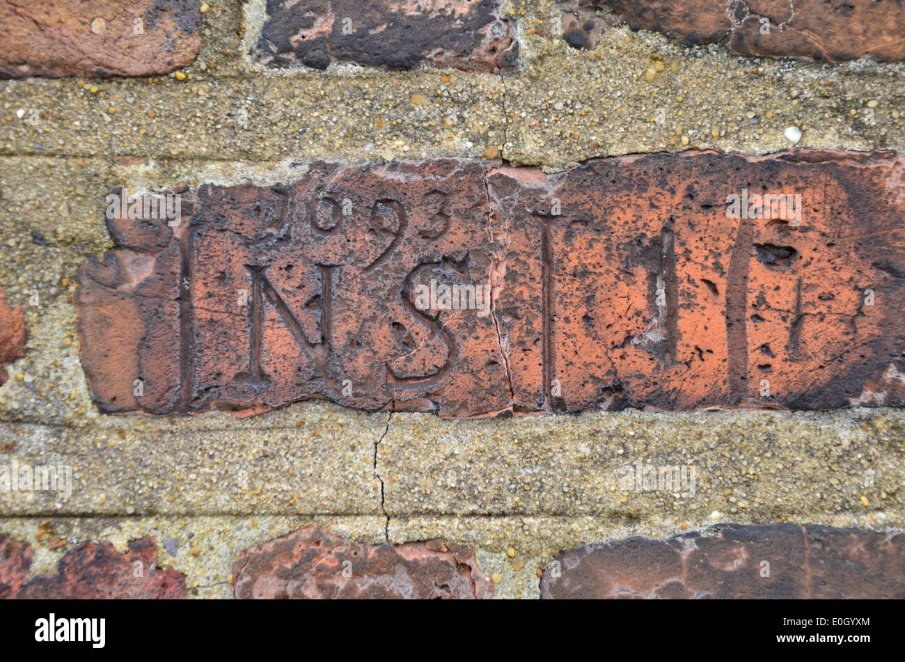 1693 graffiti carved into a brick chimney pot at Fenton House ...