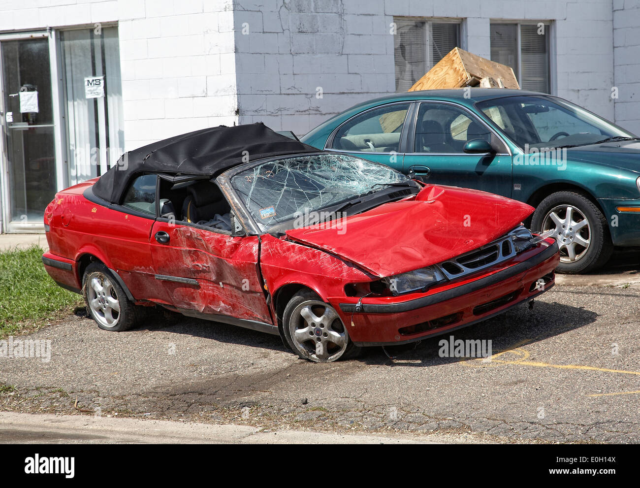 A smashed up Saab cabriolet that has been in an accident in Minneapolis ...
