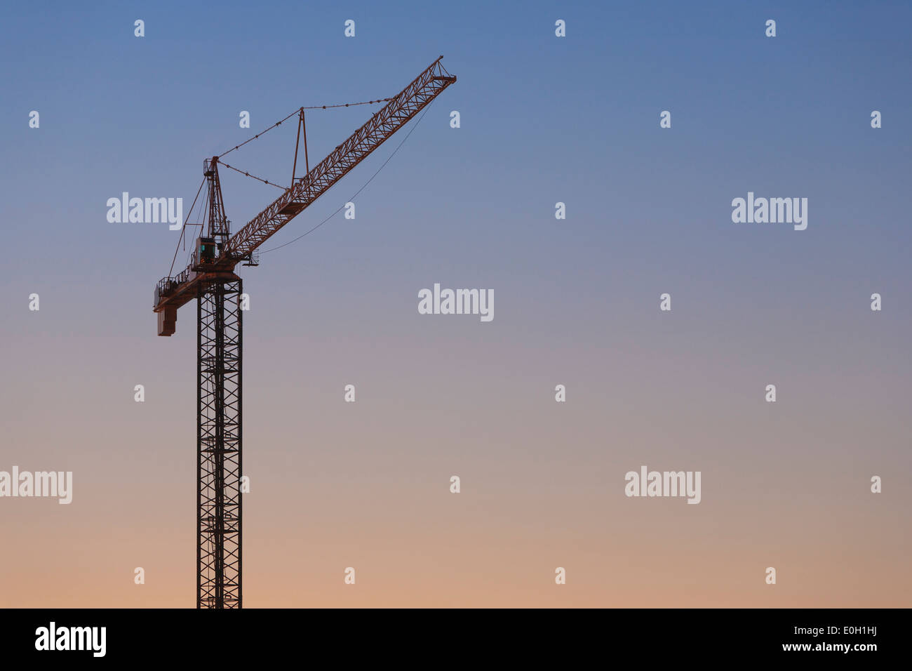 Construction crane and Low light sky Stock Photo - Alamy