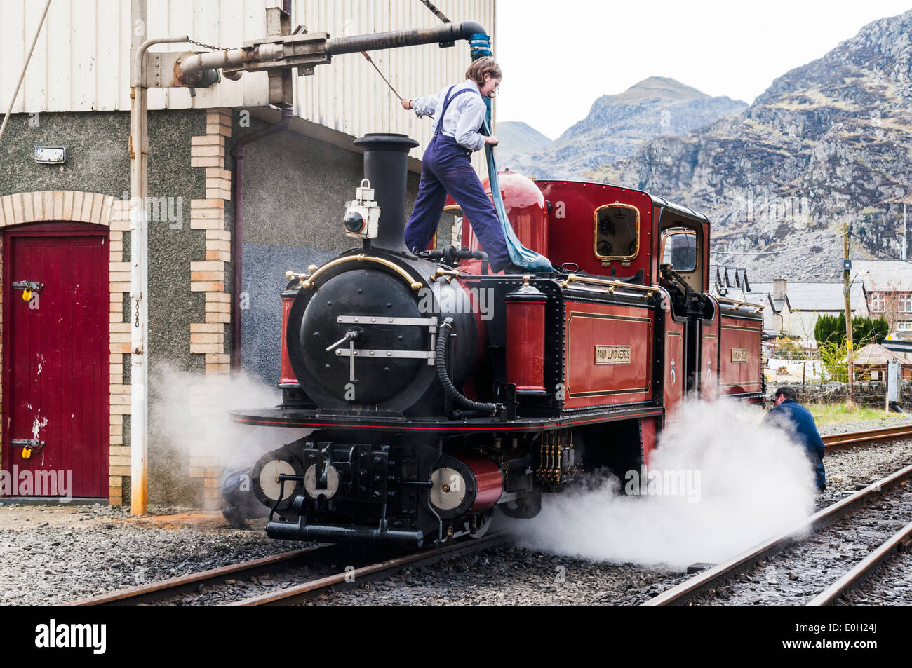 Narrow gauge steam engine being watered and checked at Blaenau ...