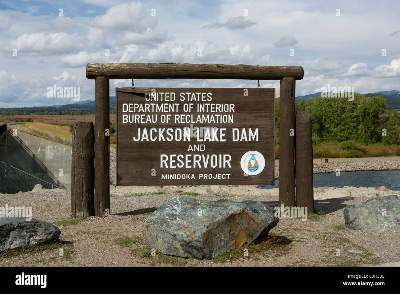 Signage next to the outflow from the Jackson Lake dam and reservoir ...