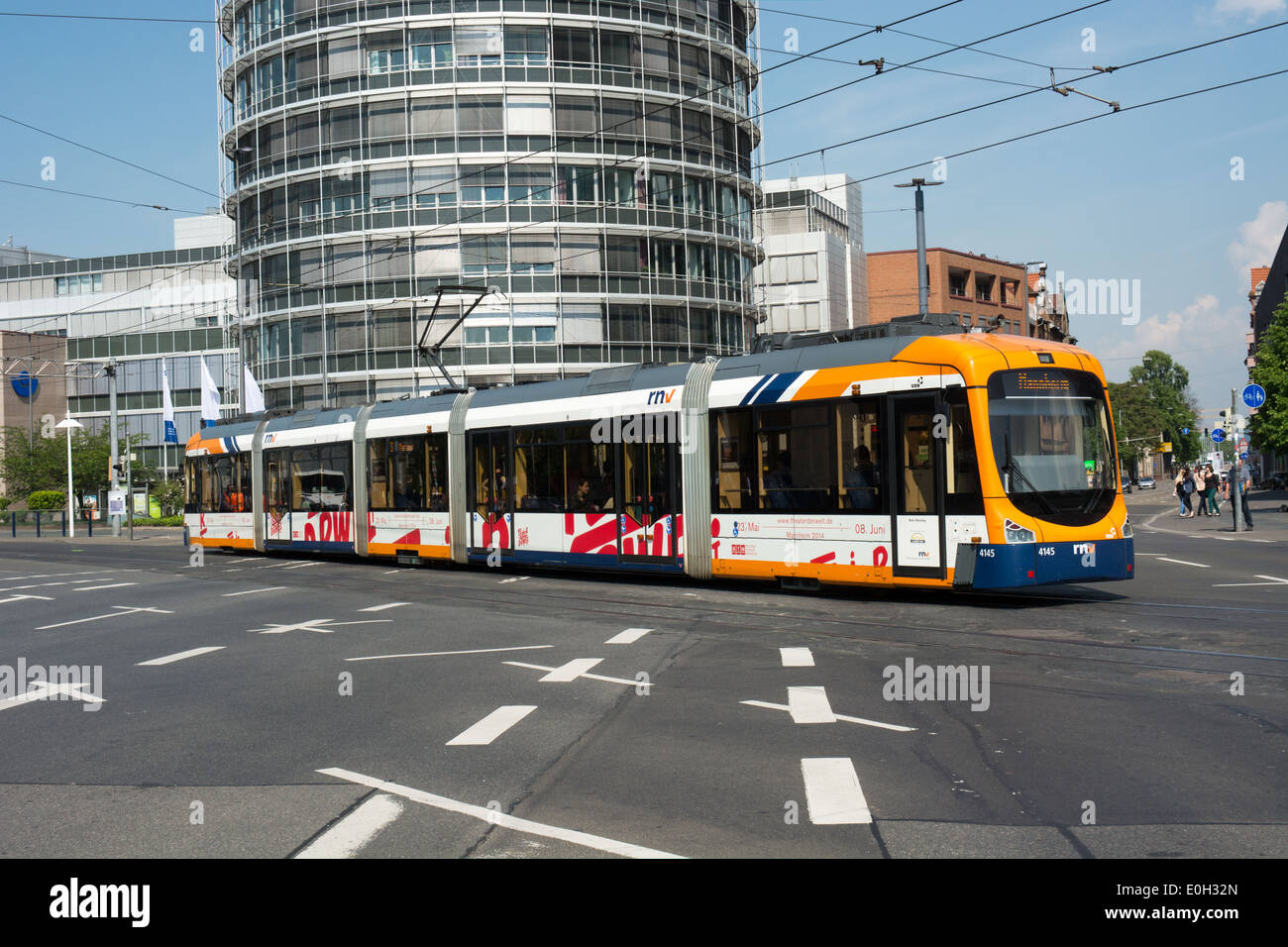 A five section articulated tram travels through the German city of ...