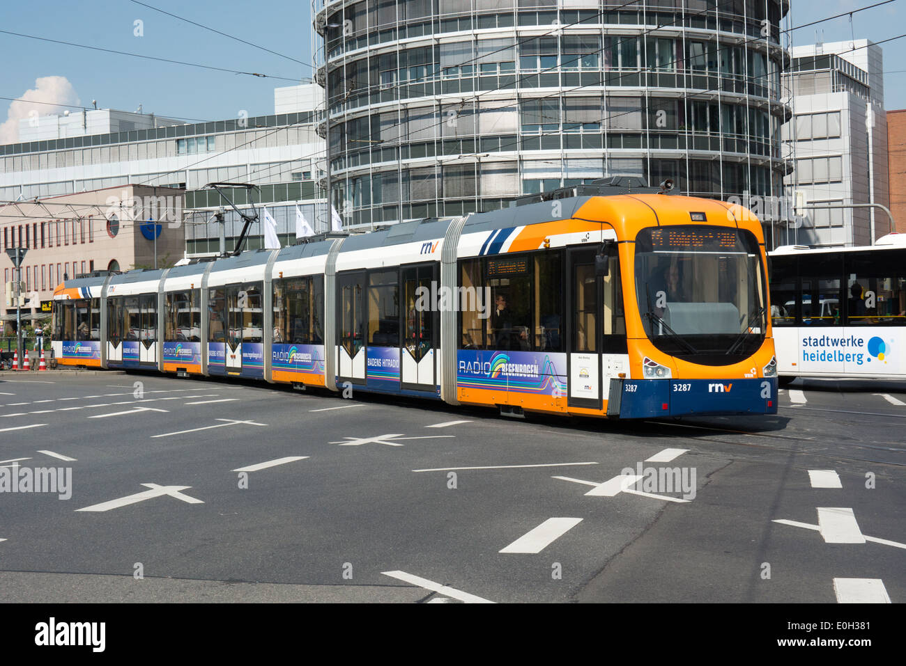 A seven section articulated tram travels through the German city of ...