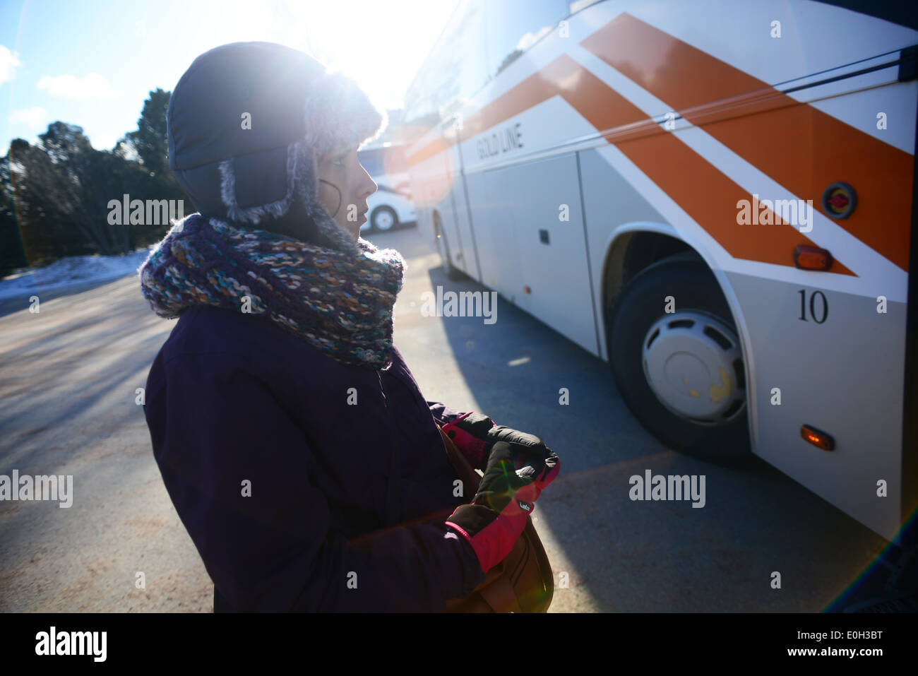 Young woman waiting for the bus in Rovaniemi Station, Lapland Stock ...