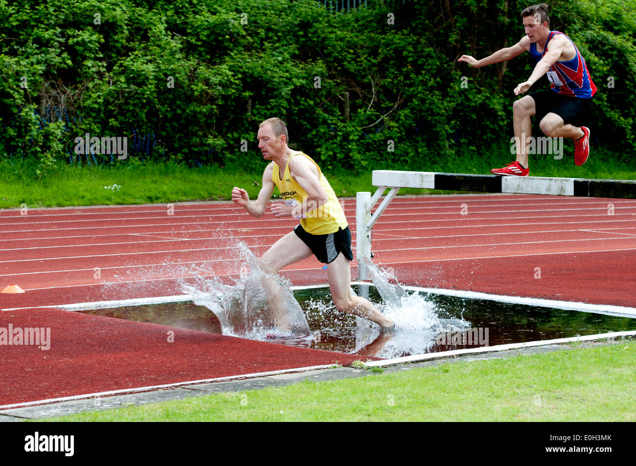 Athletics, men`s steeplechase at club level, UK Stock Photo - Alamy