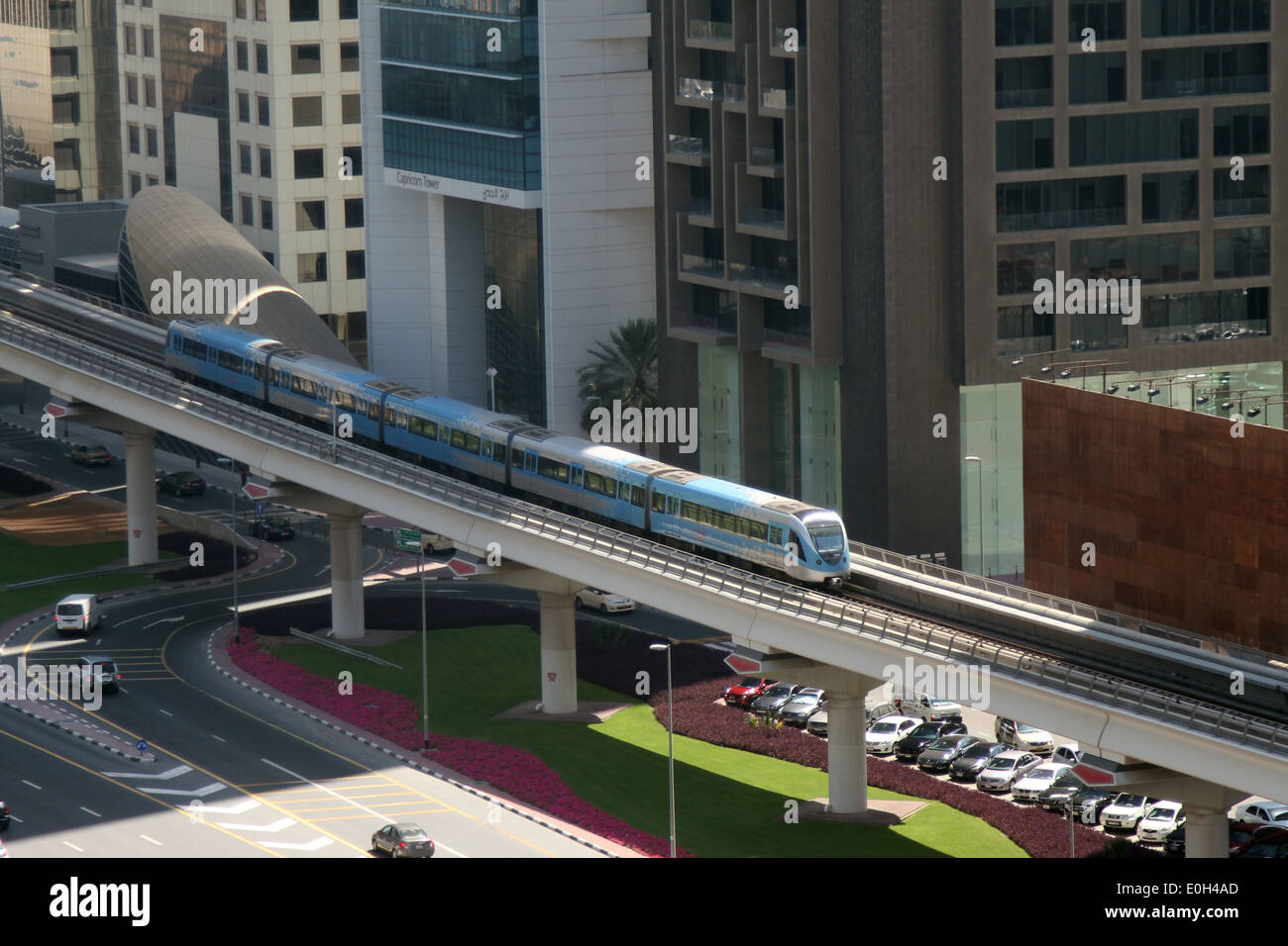 A train on the Red line of the Dubai metro travels between Emirates ...