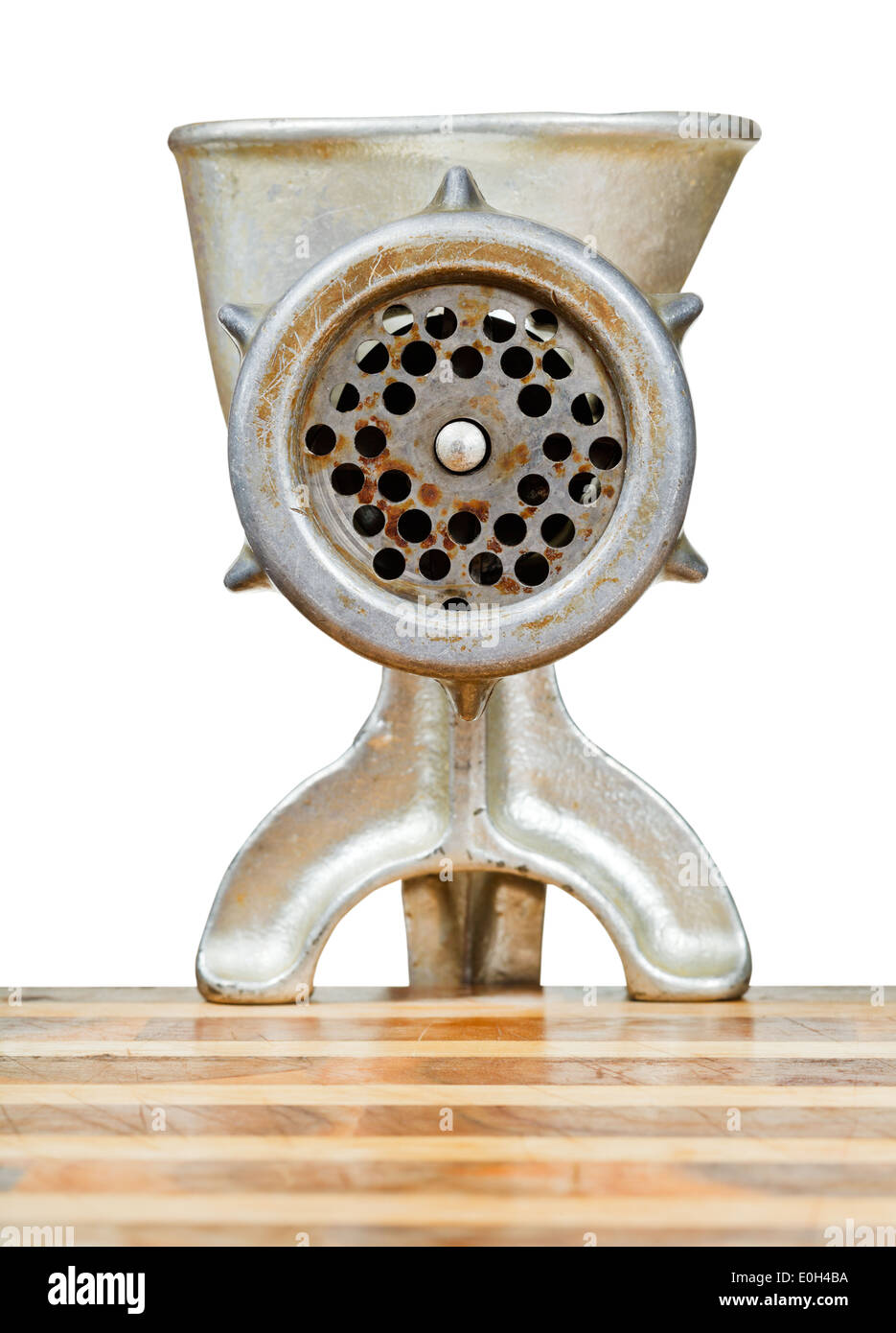 old iron meat mincer mounted on table isolated on white background ...