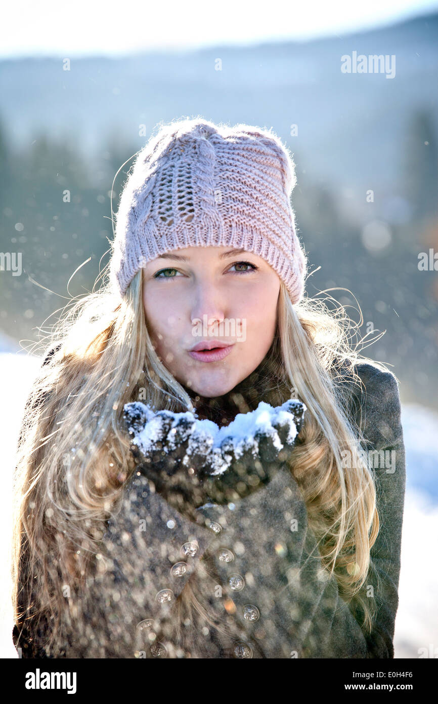 Blowing snow from hands hi-res stock photography and images - Alamy