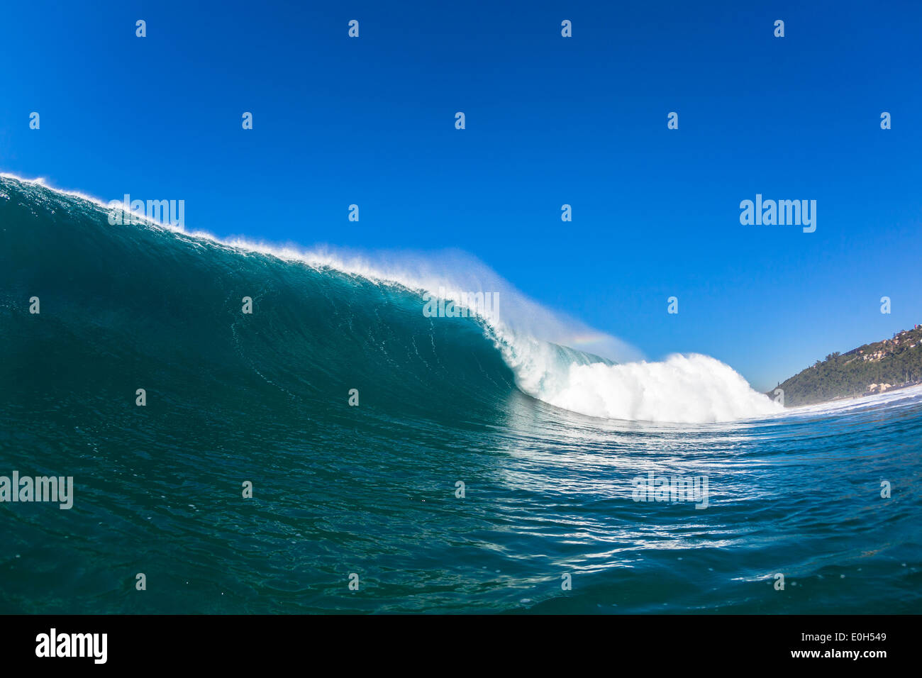 Ocean wave swimming closeup inside crashing swells of water Stock Photo ...
