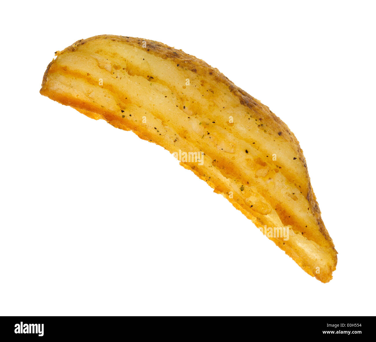 A single cooked potato wedge on a white background Stock Photo - Alamy