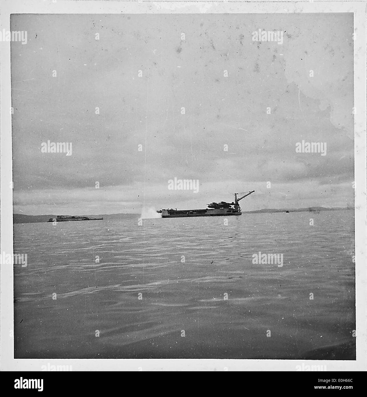 A World War II-era photograph of a seaplane station and anti-aircraft ...