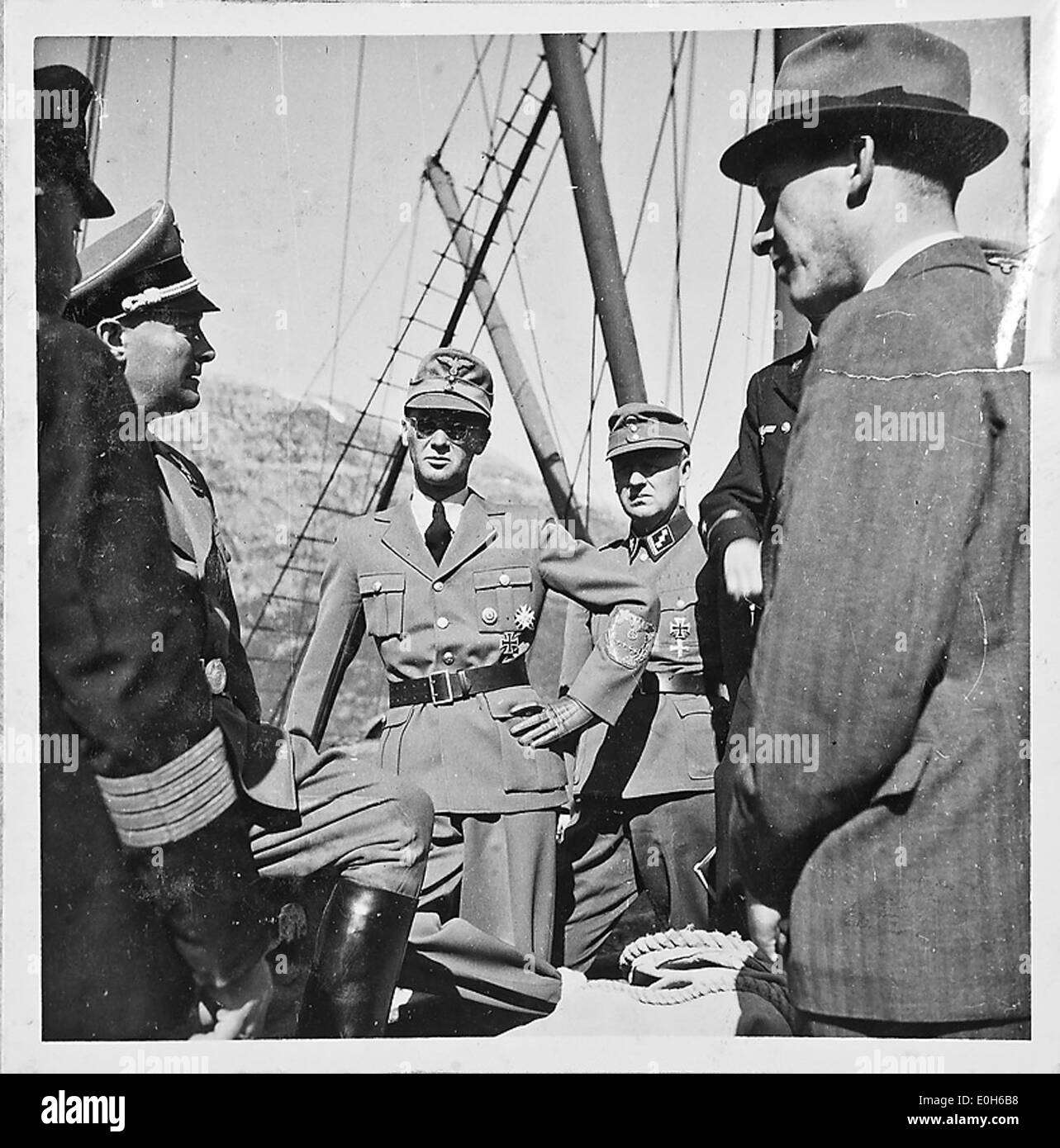 A German officer reports to the Reichskommissar during World War II ...