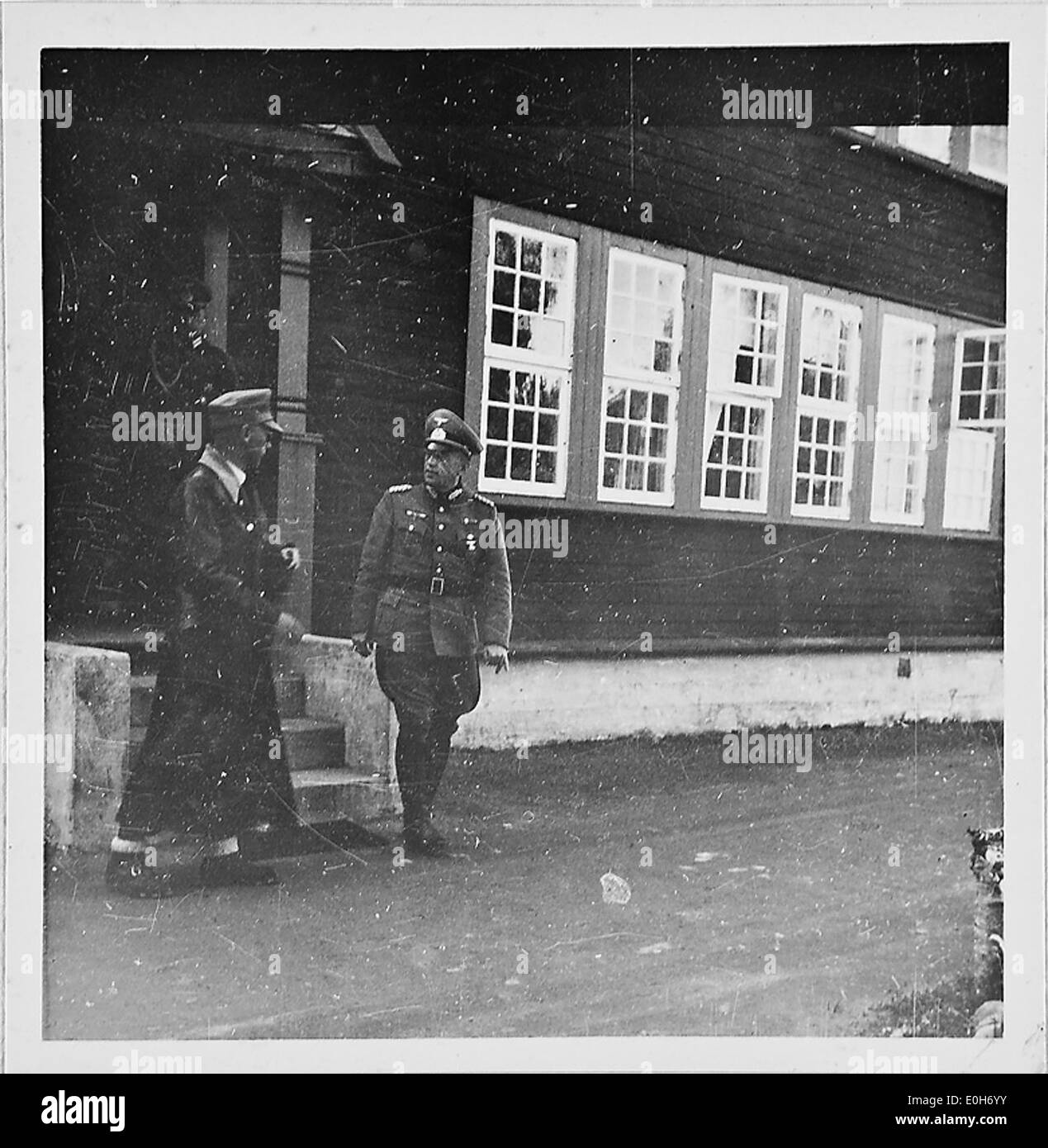 A photo from World War II showing a visit to General Raithel, a key ...