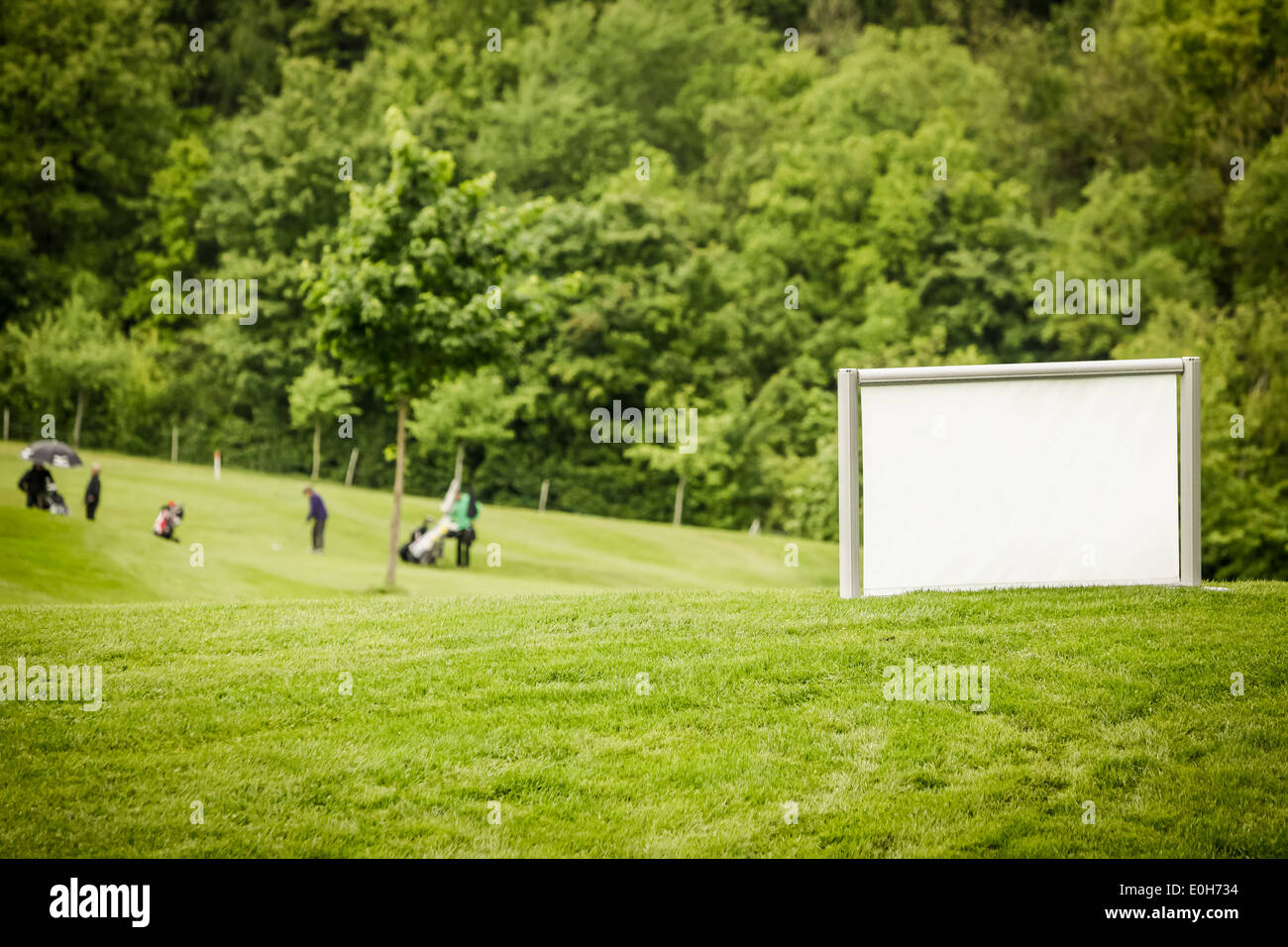 Golf Court with white sign Stock Photo - Alamy