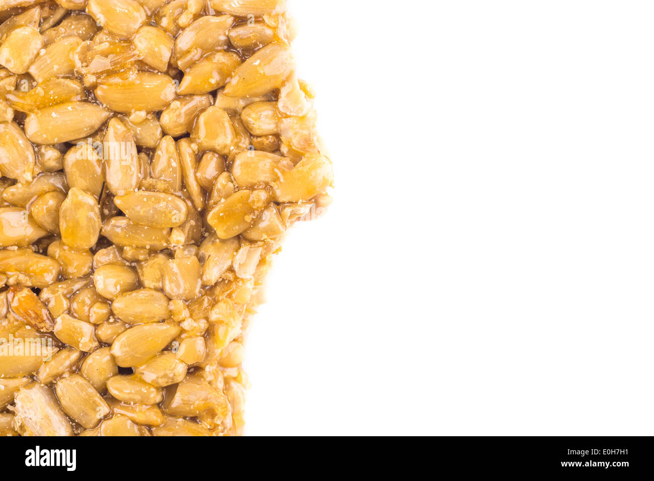 Nuts-and-honey bar, oriental sweets from candied sunflower seeds isolated on white Stock Photo ...