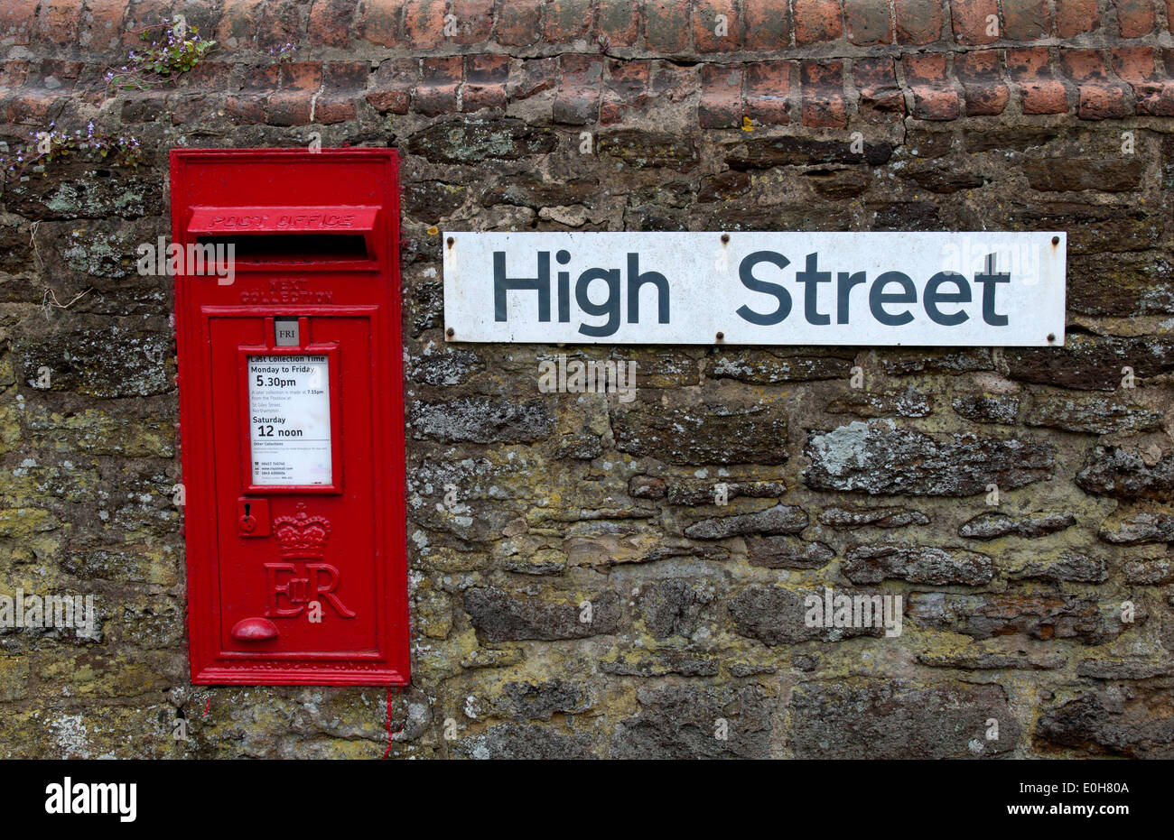 High Street sign and post box, Hardingstone, Northamptonshire, England ...