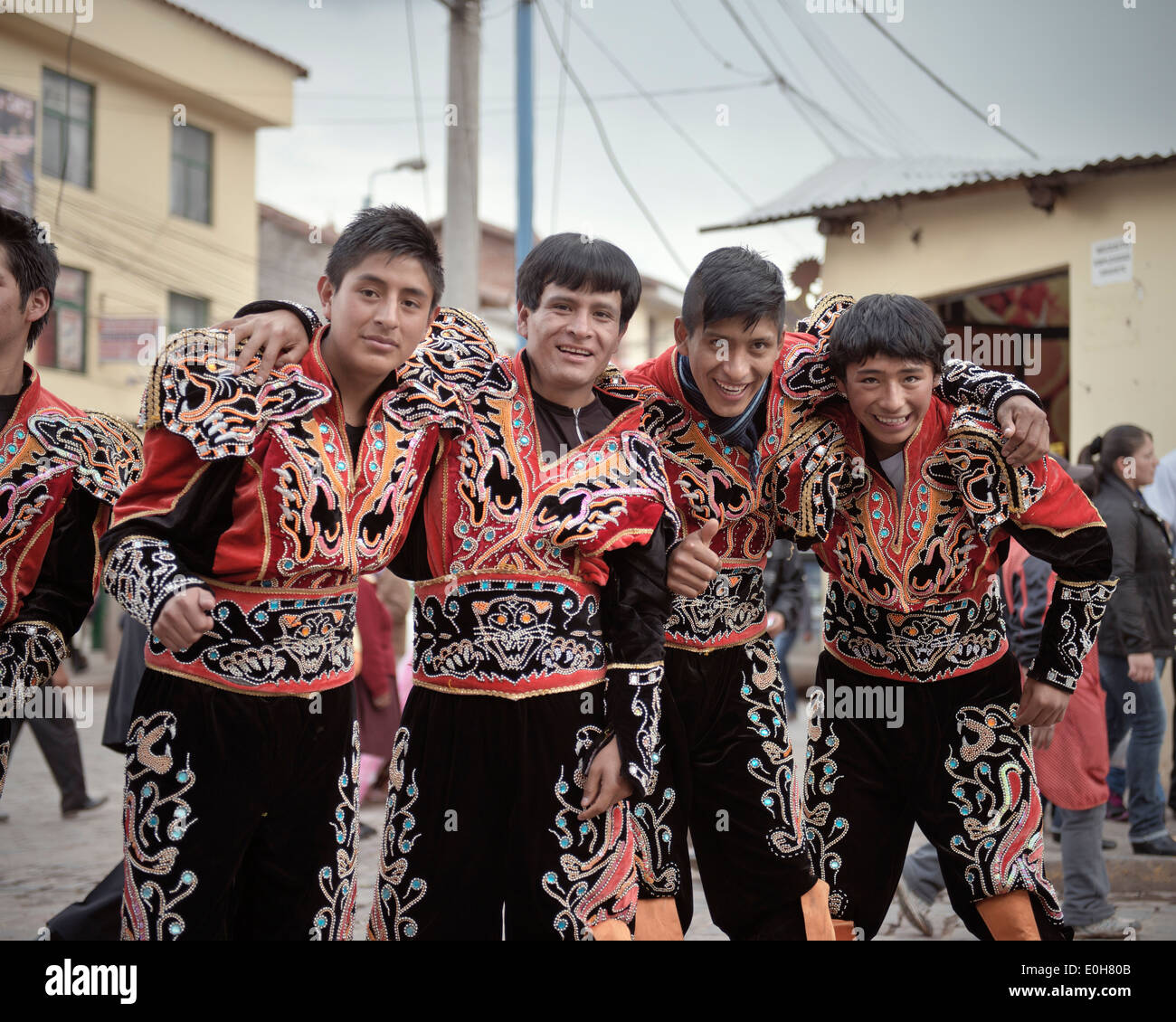 Young peruvian boys with tradtional dresses during a procession in ...