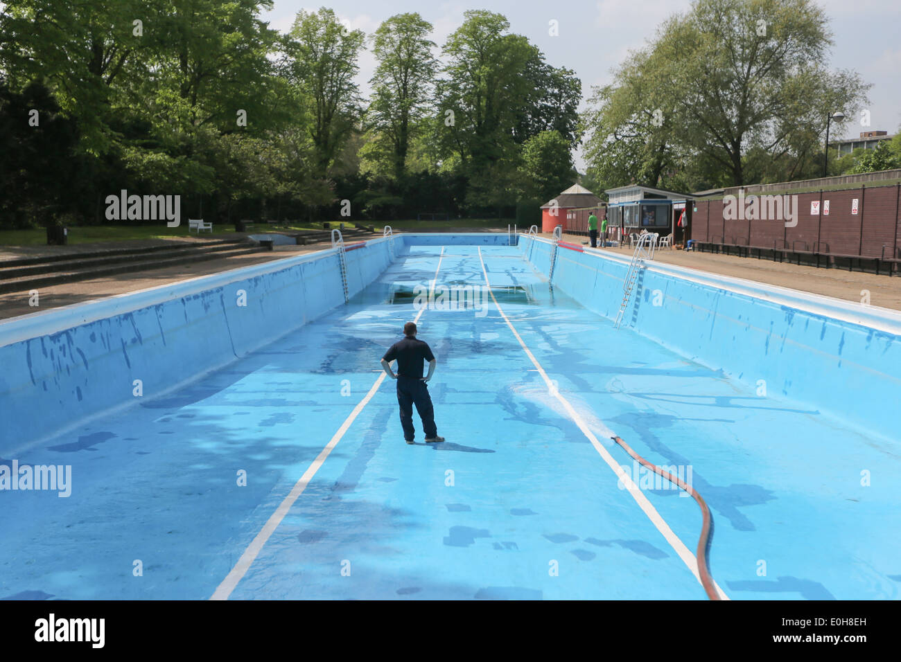 Filling pool hosepipe hi-res stock photography and images - Alamy