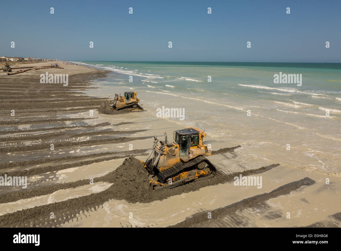 The Army Corps of Engineers use heavy machinery to restore the beach during a major beach ...