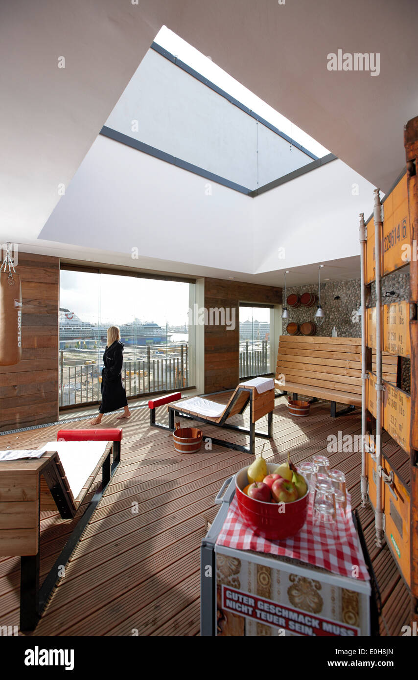 Woman in relaxing area of a sauna in a hotel, HafenCity, Hamburg ...