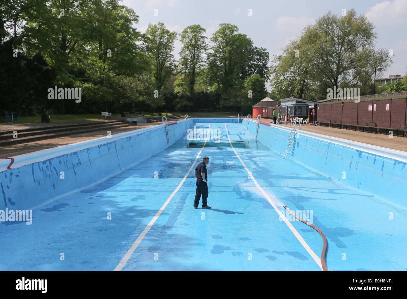 Filling pool hosepipe hi-res stock photography and images - Alamy