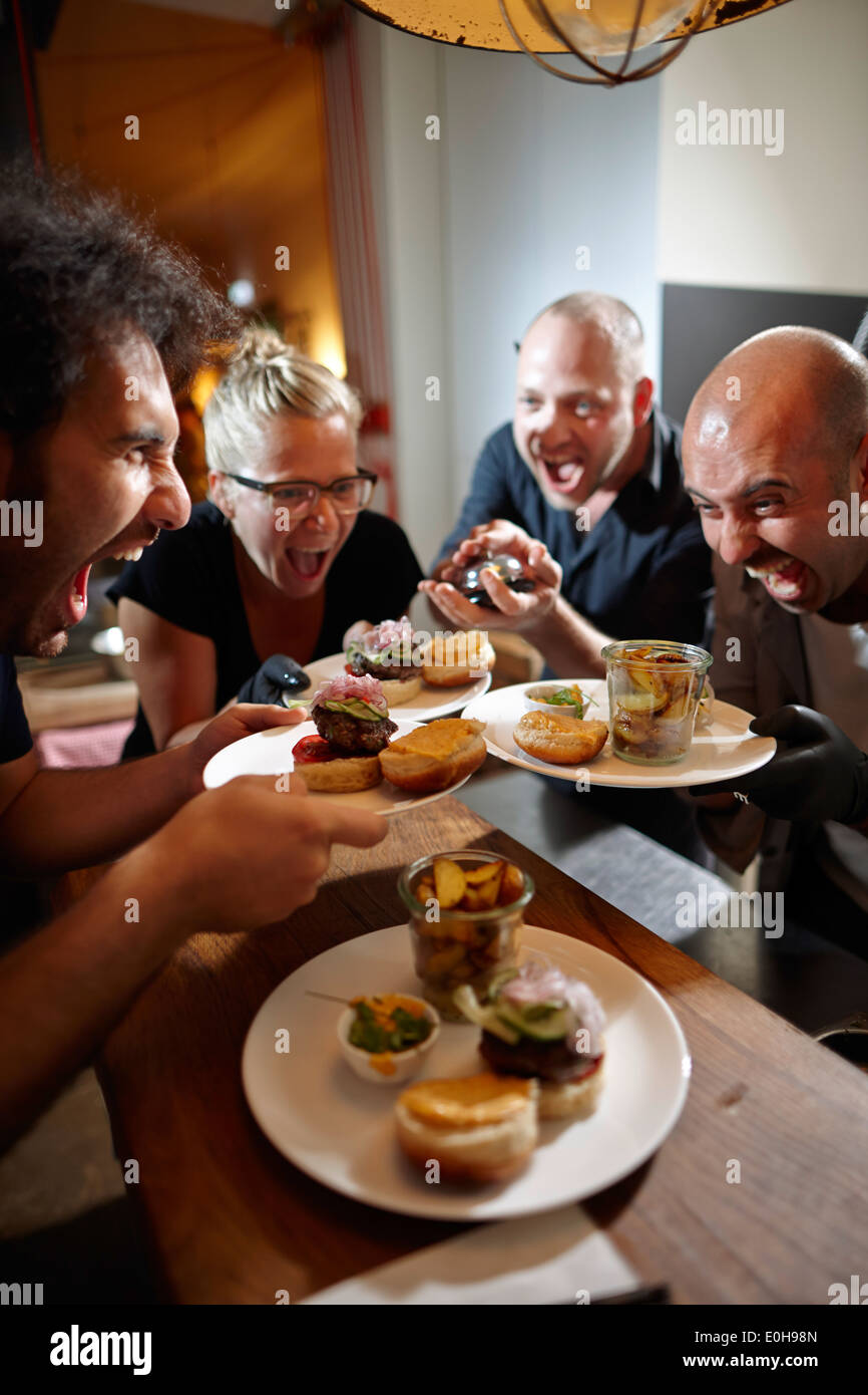 Chefs of mobile kitchen unit 'Kitchen Guerilla' in restaurant ...