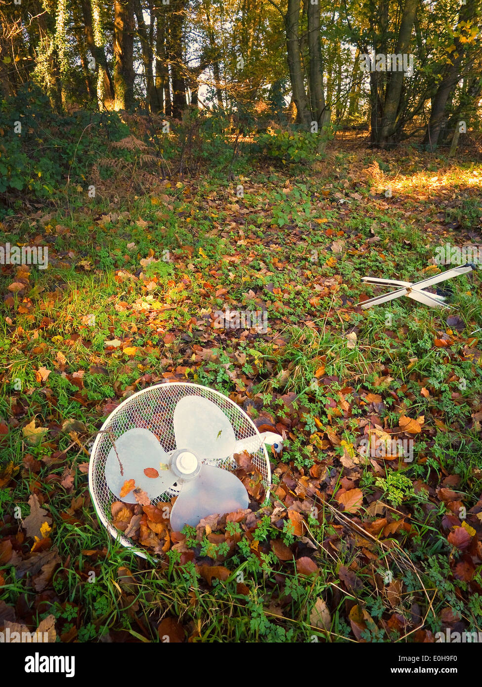 Old electric fan dumped on private land in UK Stock Photo - Alamy