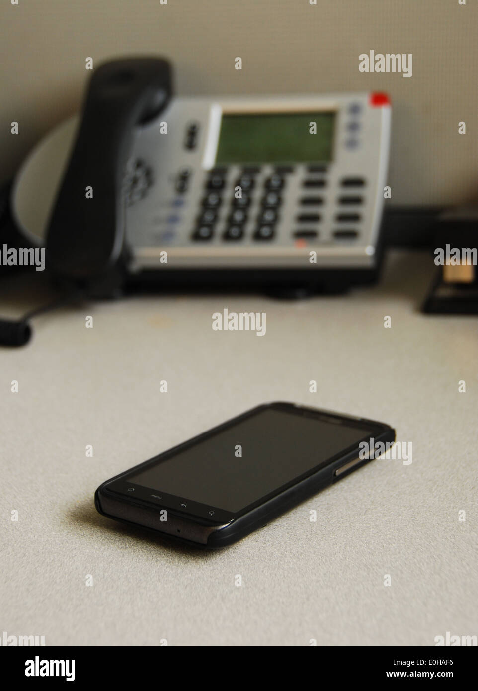 Cell Phone and Desk Phone Stock Photo - Alamy